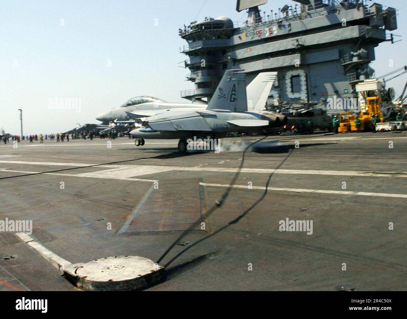 US Navy An F-A-18F Super Hornet, assigned to the Jolly Rogers of Strike ...