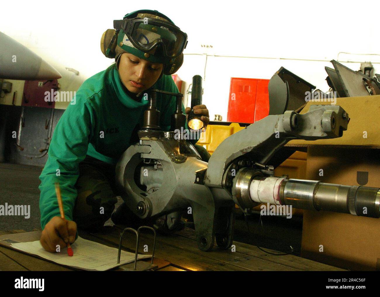 US Navy Aviation Machinist's Mate Airman inventories aircraft ...