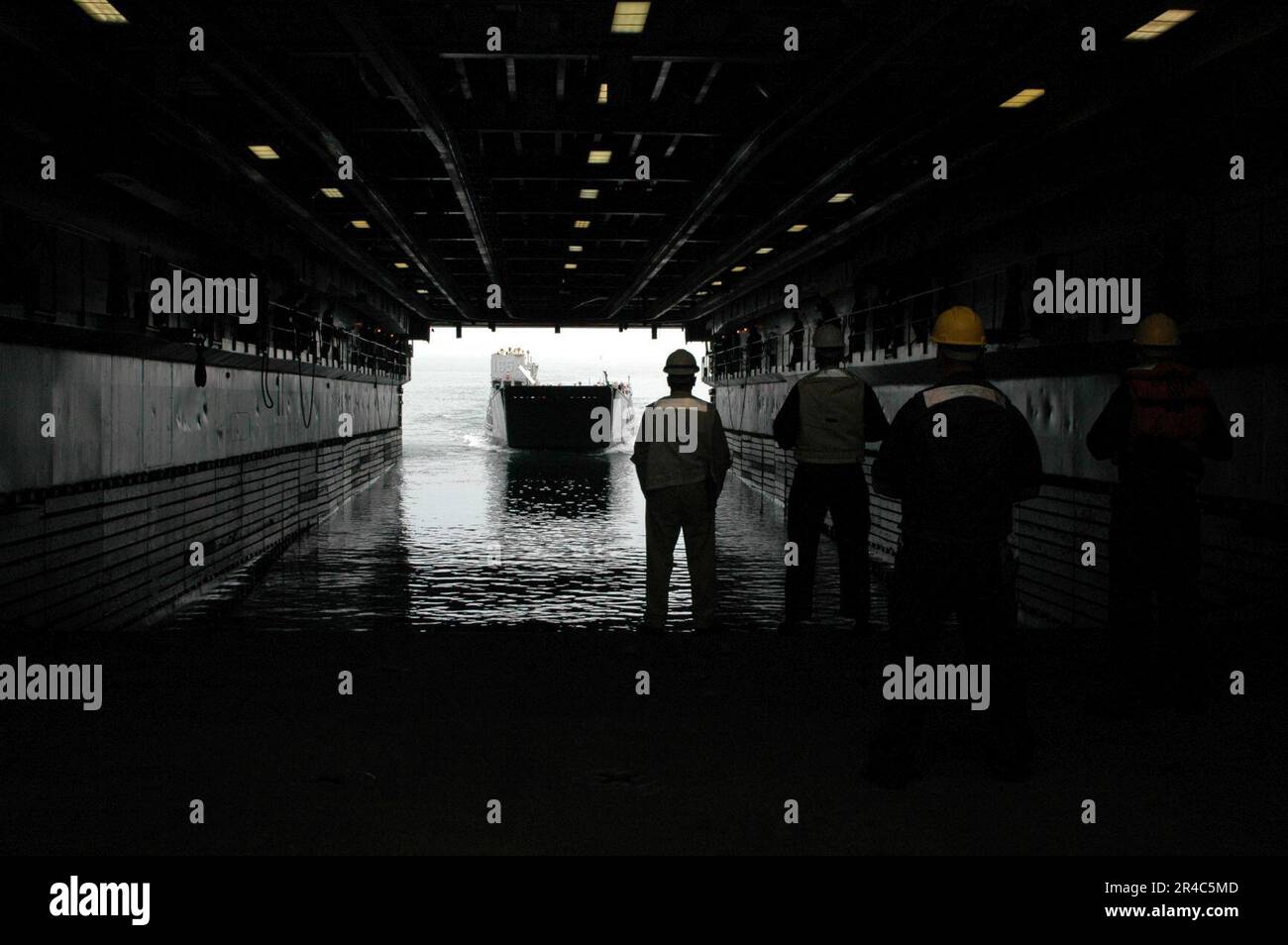 US Navy Sailors aboard the amphibious transport dock ship USS Nashville ...