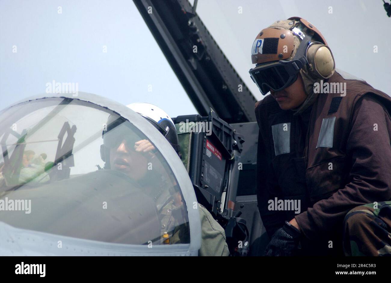 US Navy Airman assigned to the Gunslingers of Strike Fighter Squadron ...