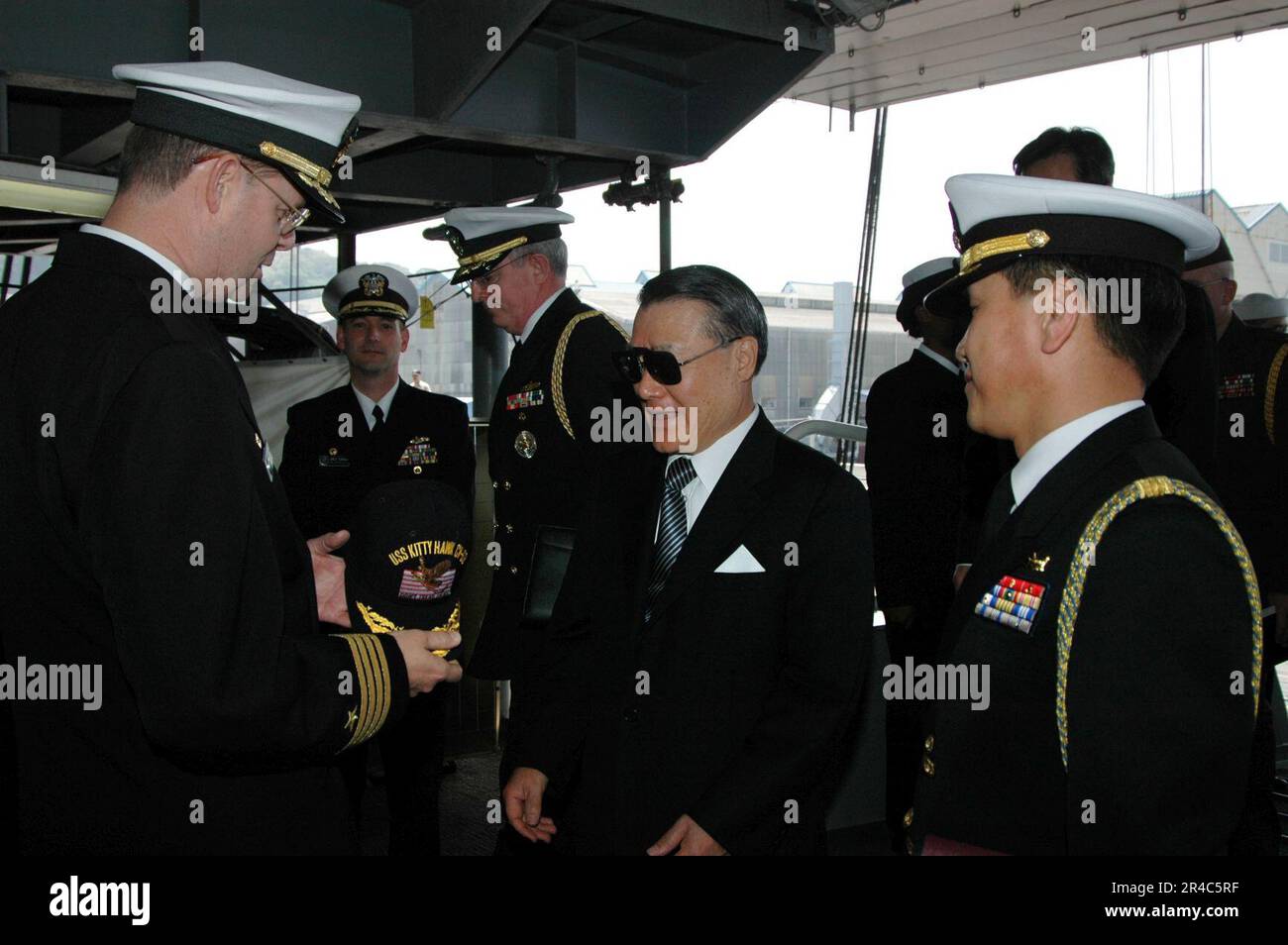 US Navy USS Kitty Hawk (CV 63) Commanding Officer, Capt. presents Ra ...