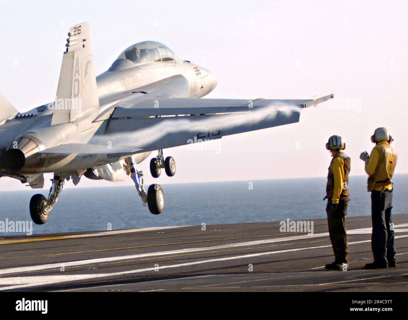 US Navy A U.S. Navy F-A-18F Super Hornet aircraft leaves the flight ...