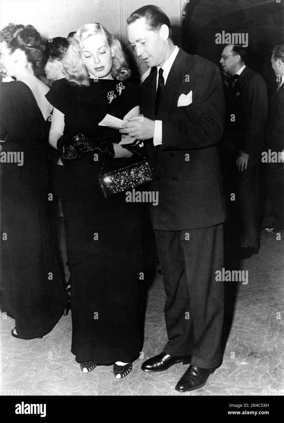 FRANCHOT TONE and his 3rd wife BARBARA PAYTON at a Hollywood luncheon ...