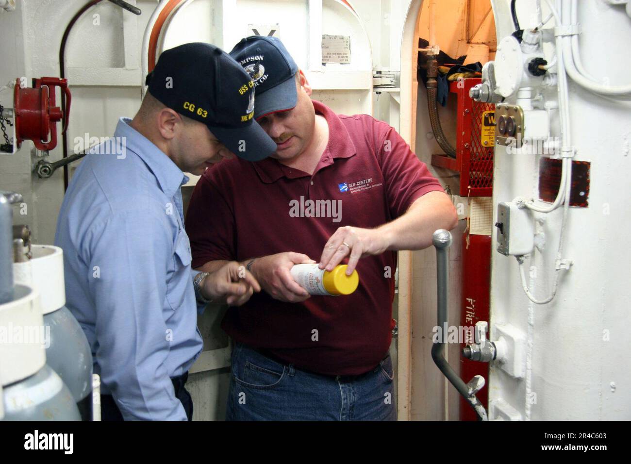 US Navy Naval Sea Systems Command (NAVSEA) employee explains to Store ...