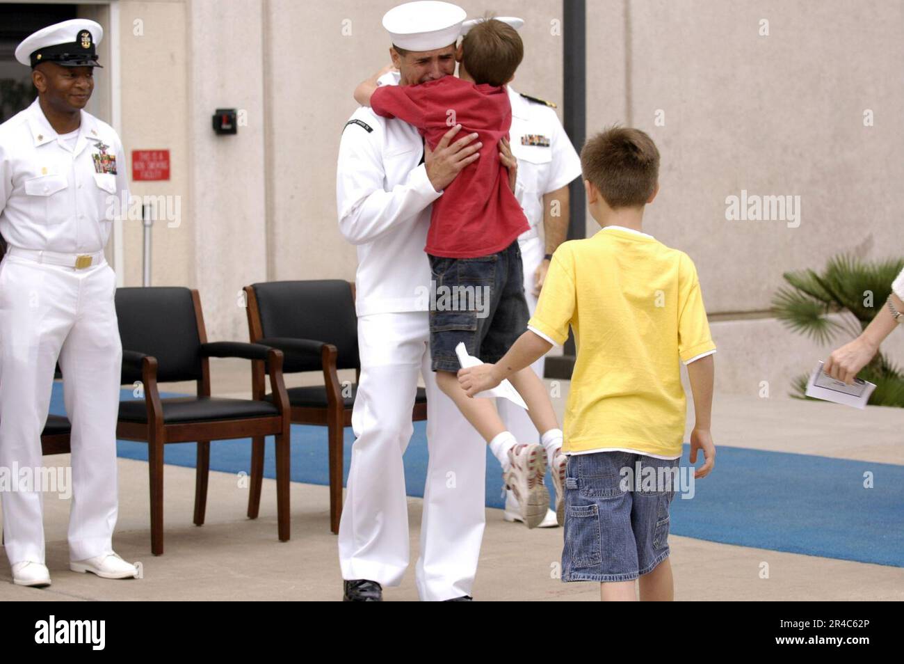 US Navy Hospital Corpsman 2nd Class gets a hug from his children after ...