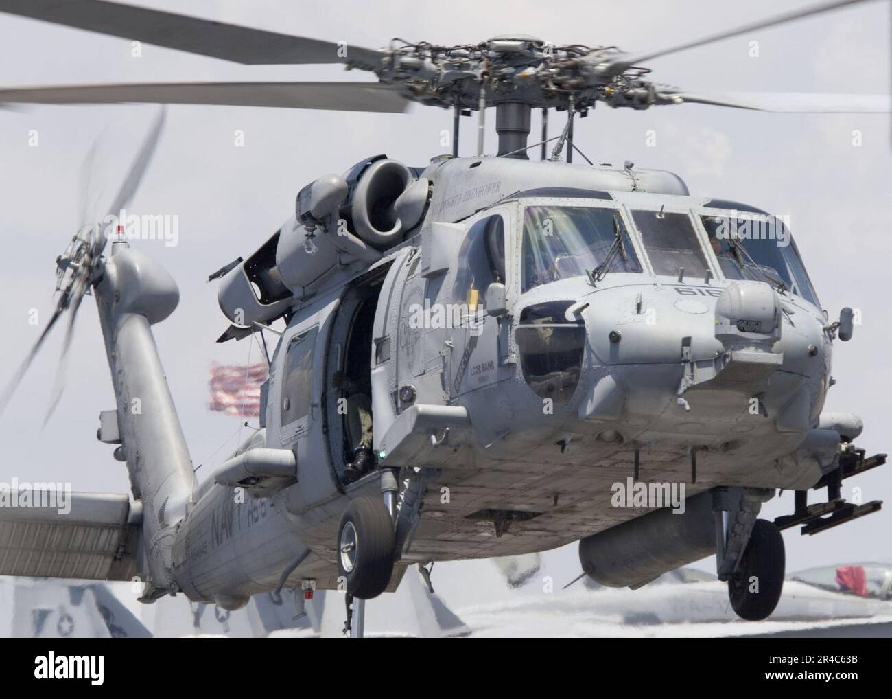 US Navy An HH-60H Seahawk helicopter takes off from the flight deck aboard the Nimitz-class ...