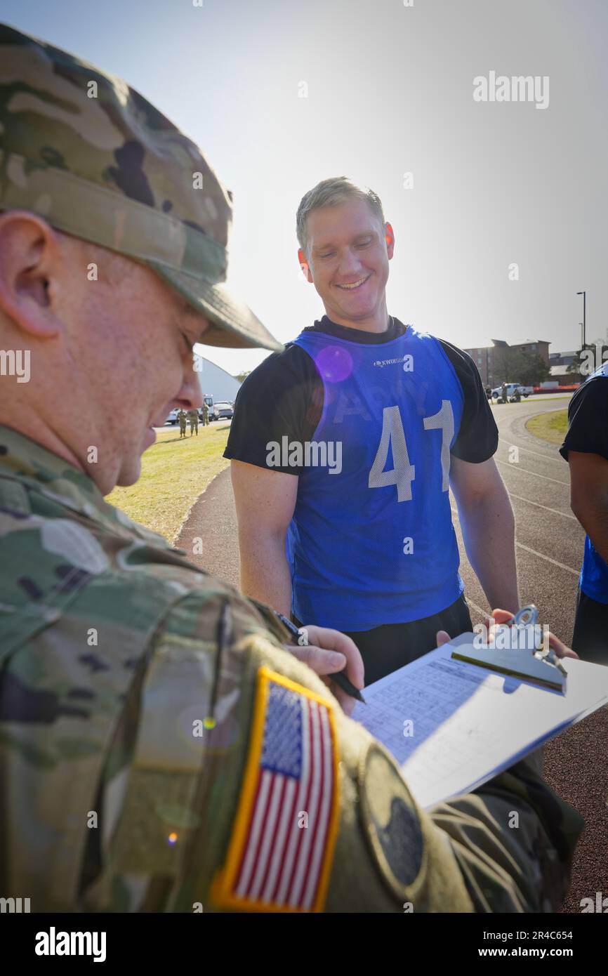 Spc. Adam Biggerstaff checks in with cadre before completing the 1000 ...