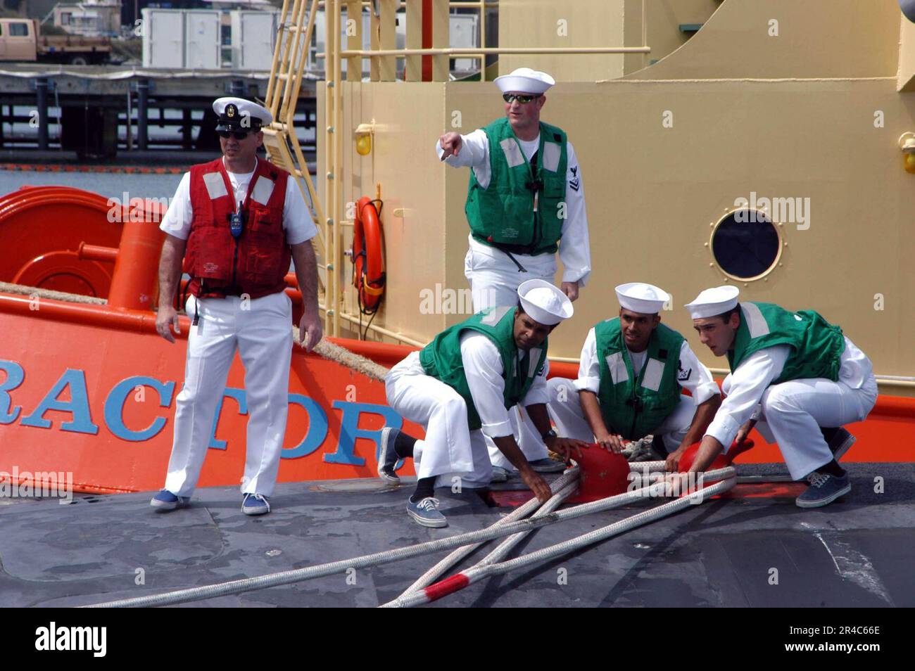 US Navy Sailors assigned to Los Angeles-class submarine USS Jefferson ...