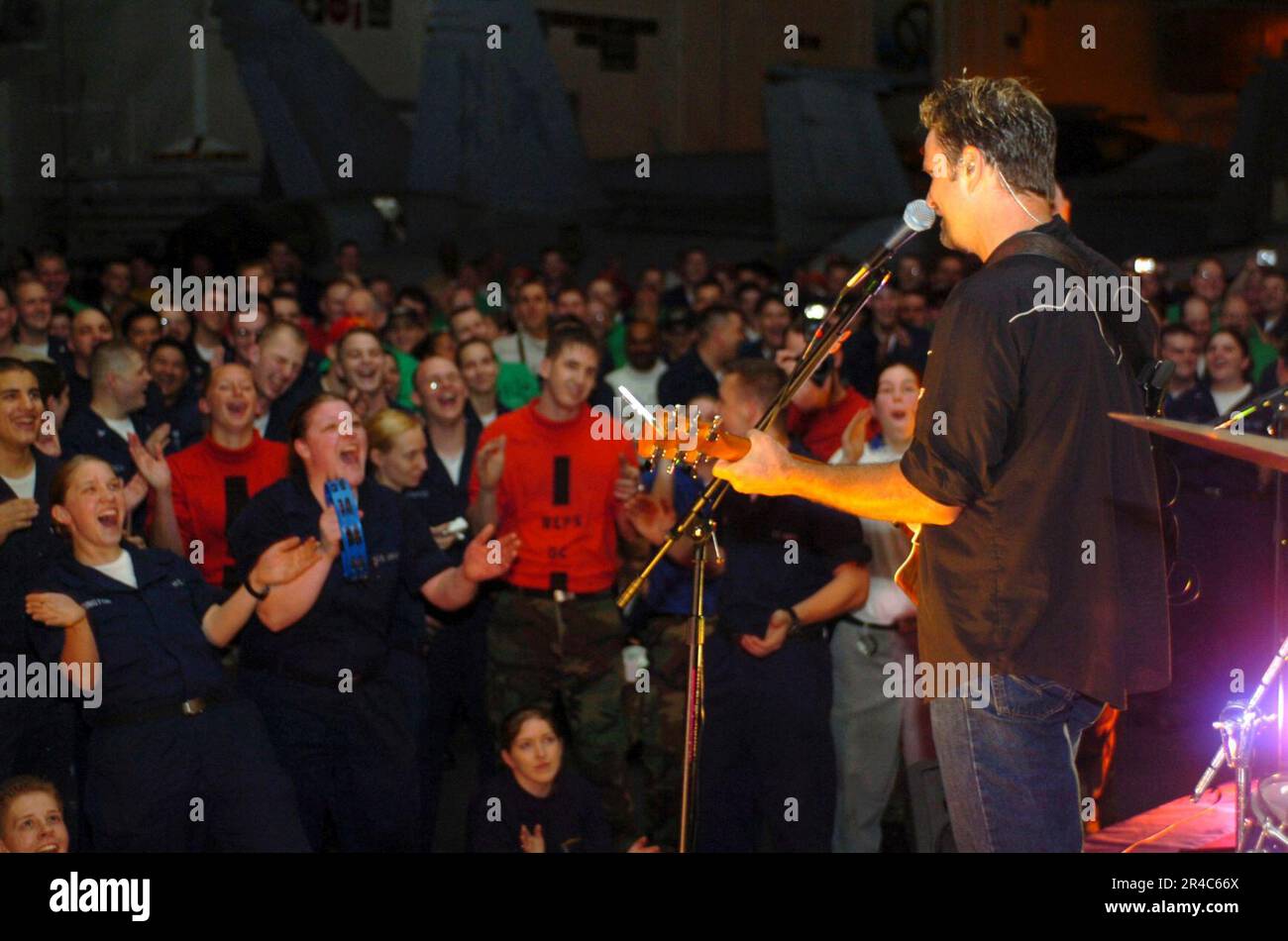 US Navy On a stage surrounded by thousands of cheering Sailors, Country ...