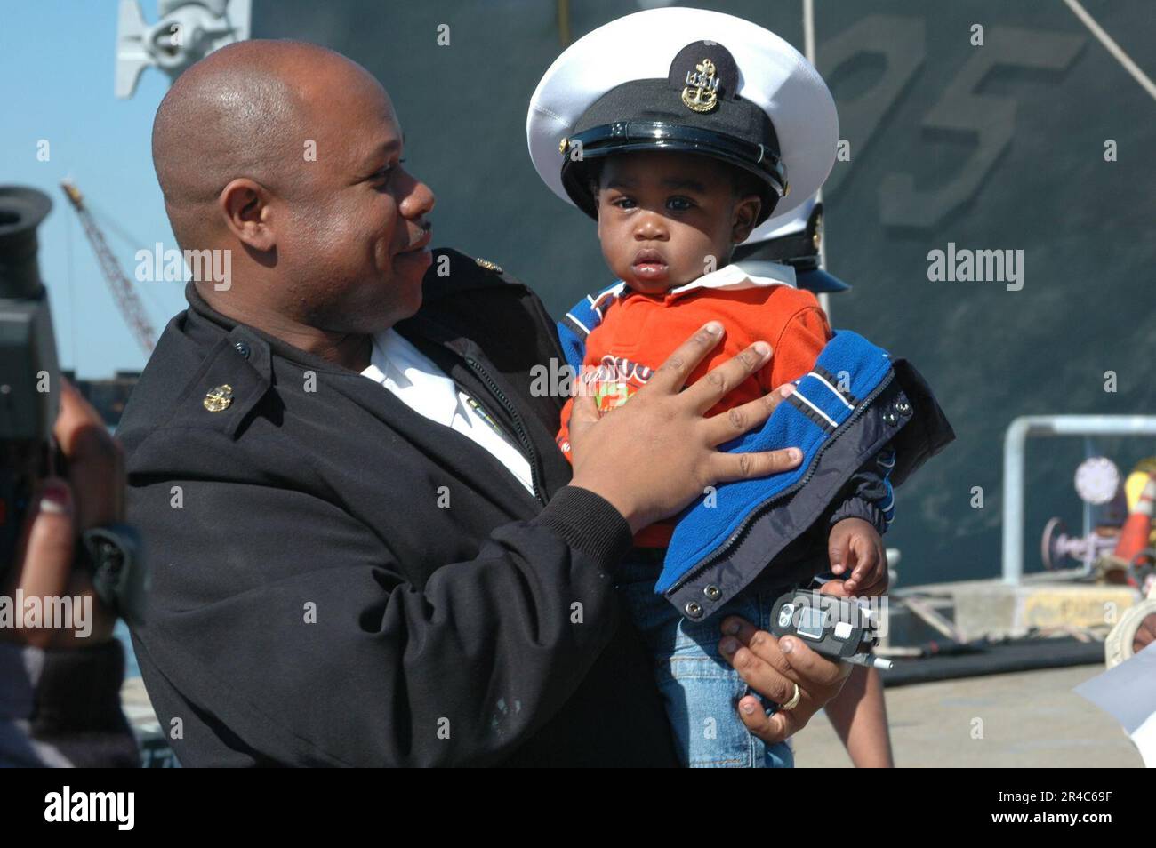 US Navy Chief Quartermaster says a final farewell to his son before ...