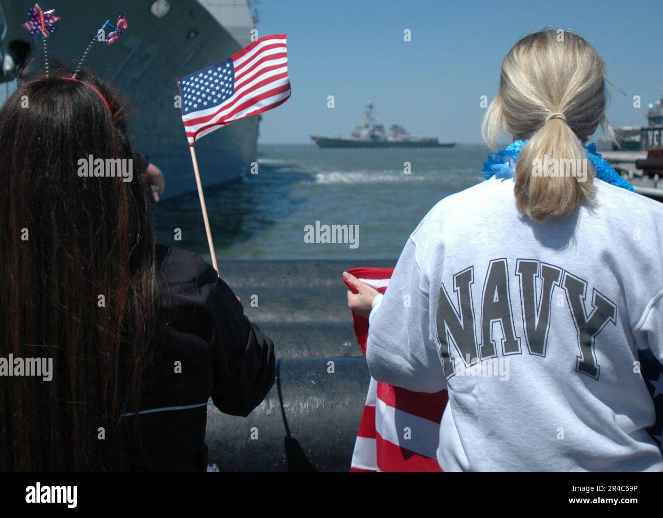 US Navy Friends and loved ones of Sailors aboard the guided missile ...