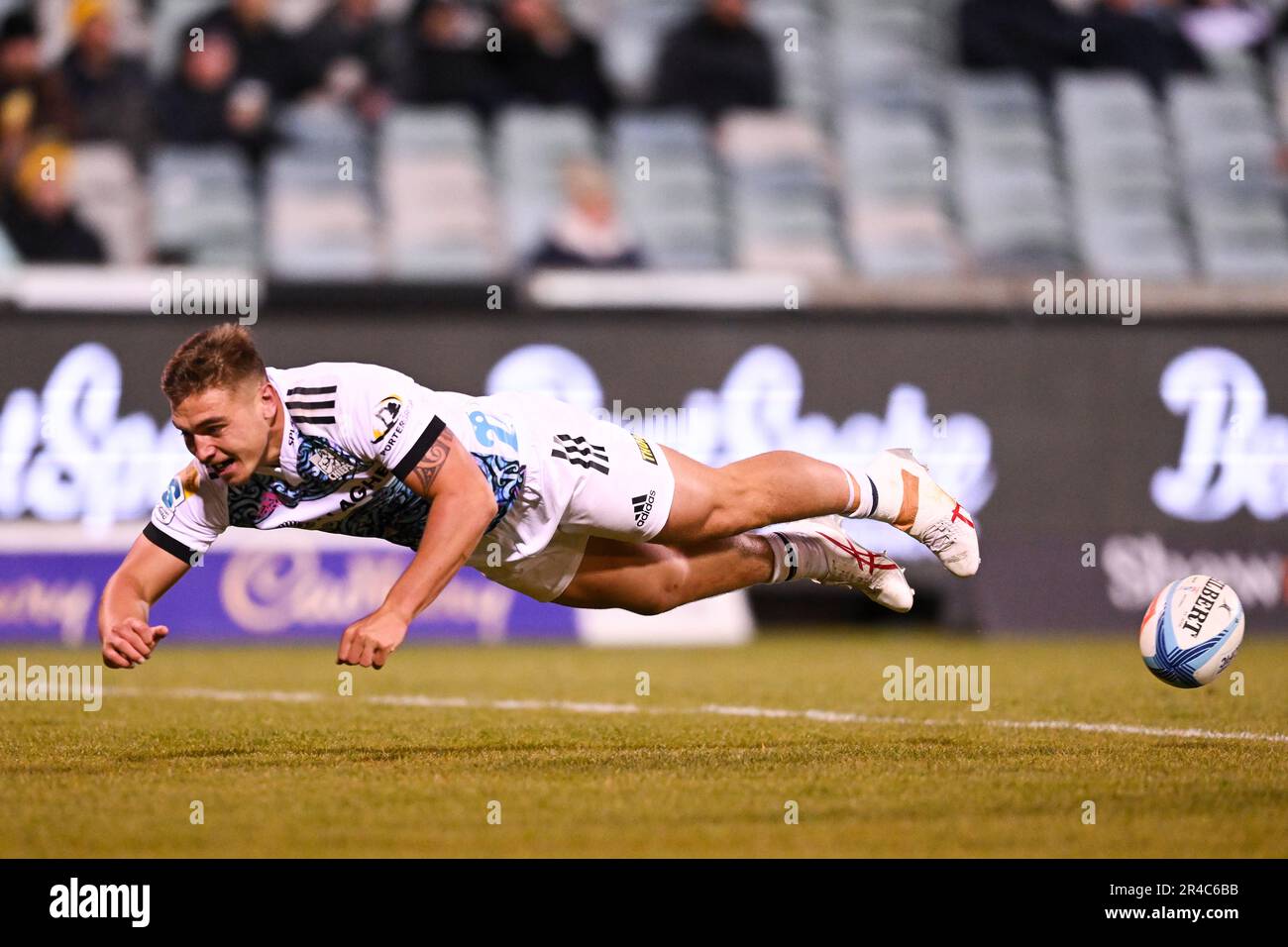 Canberra, Australia. 27th May, 2023. Cortez Ratima of the Chiefs scores ...