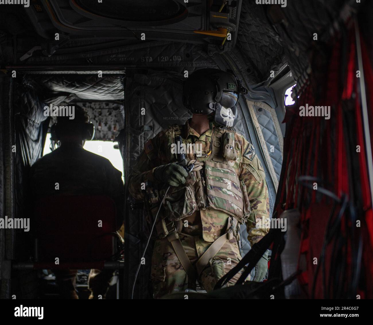 U.S. Soldier Sgt. Caleb Assink, a crew chief with the 1st Battalion ...