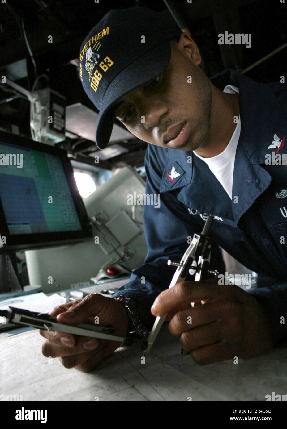 US Navy Quartermaster 3rd Class assigned to the guided-missile ...