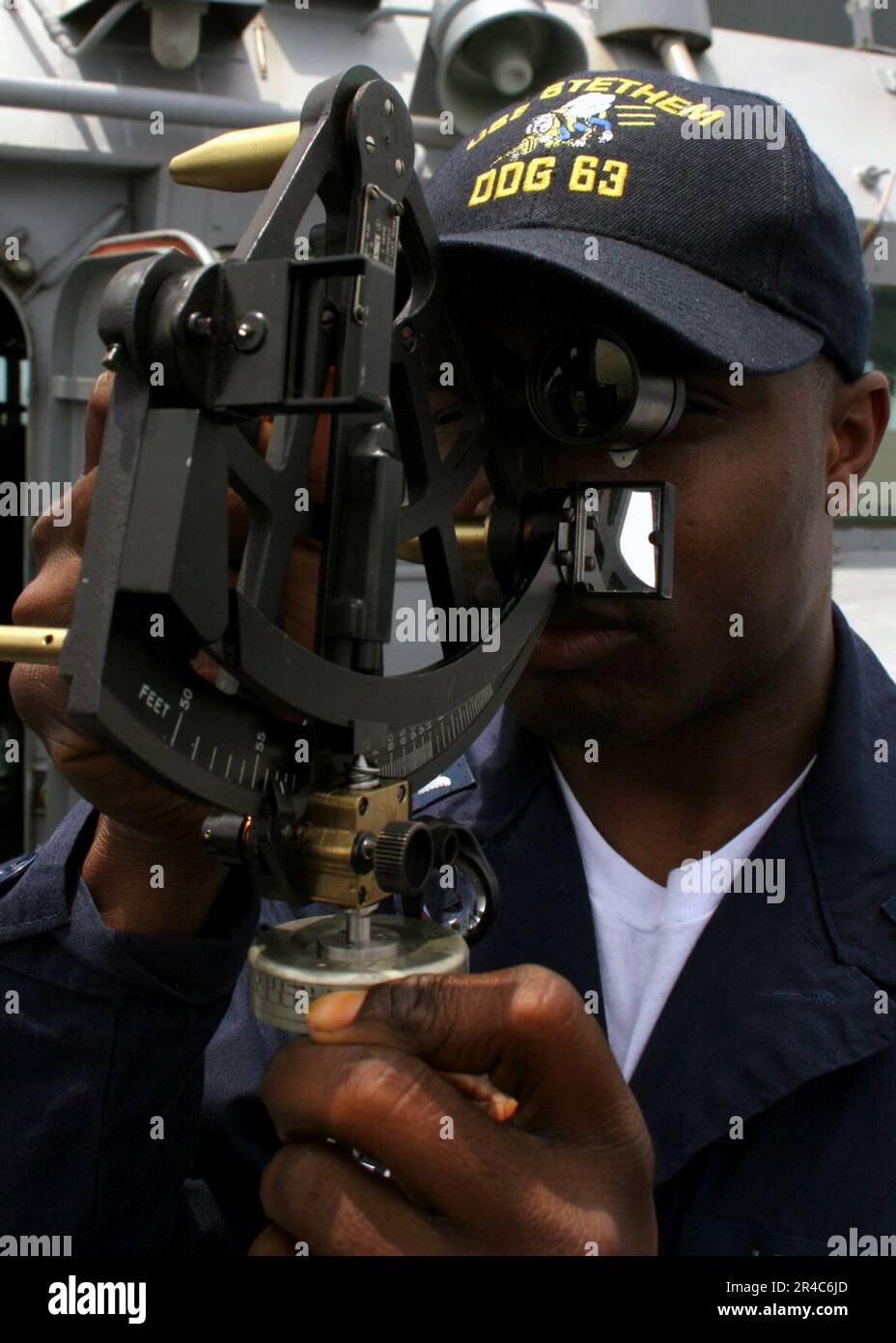 US Navy Quartermaster 3rd Class uses the Sextant to determine the ...