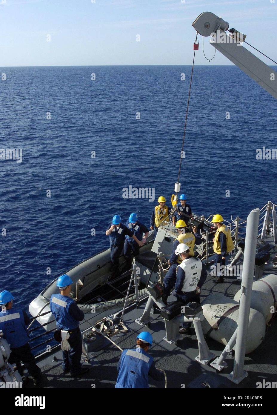 US Navy Sailors assigned to the Arleigh Burke-class guided missile ...