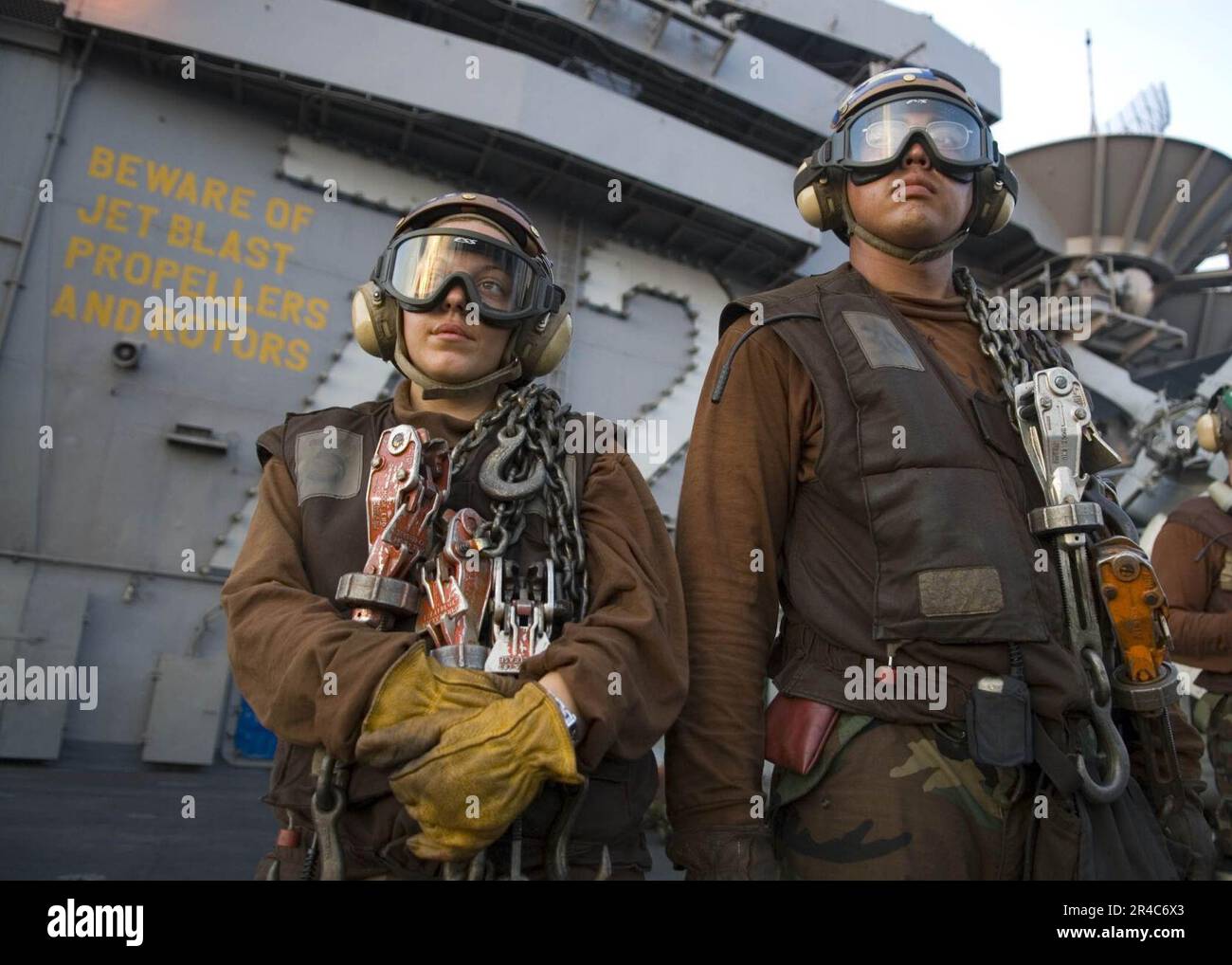 US Navy Plane captains stand by as their aircraft is launched during ...