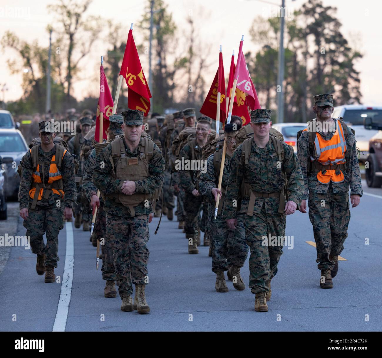 U.S. Marines and Sailors with 2d Marine Division approach the finish ...