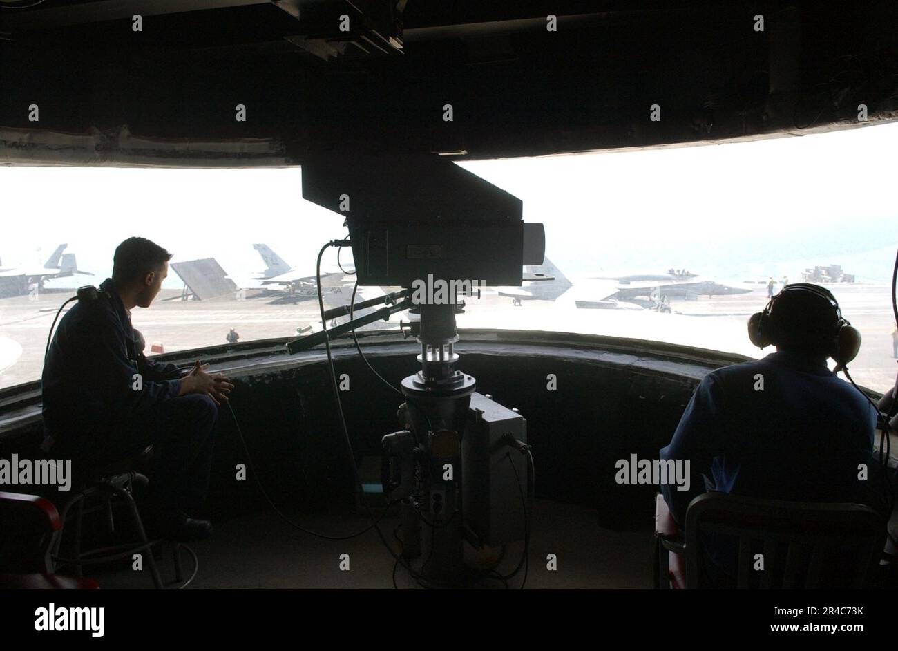 US Navy Interior Communications Electrician Fireman watches the flight ...