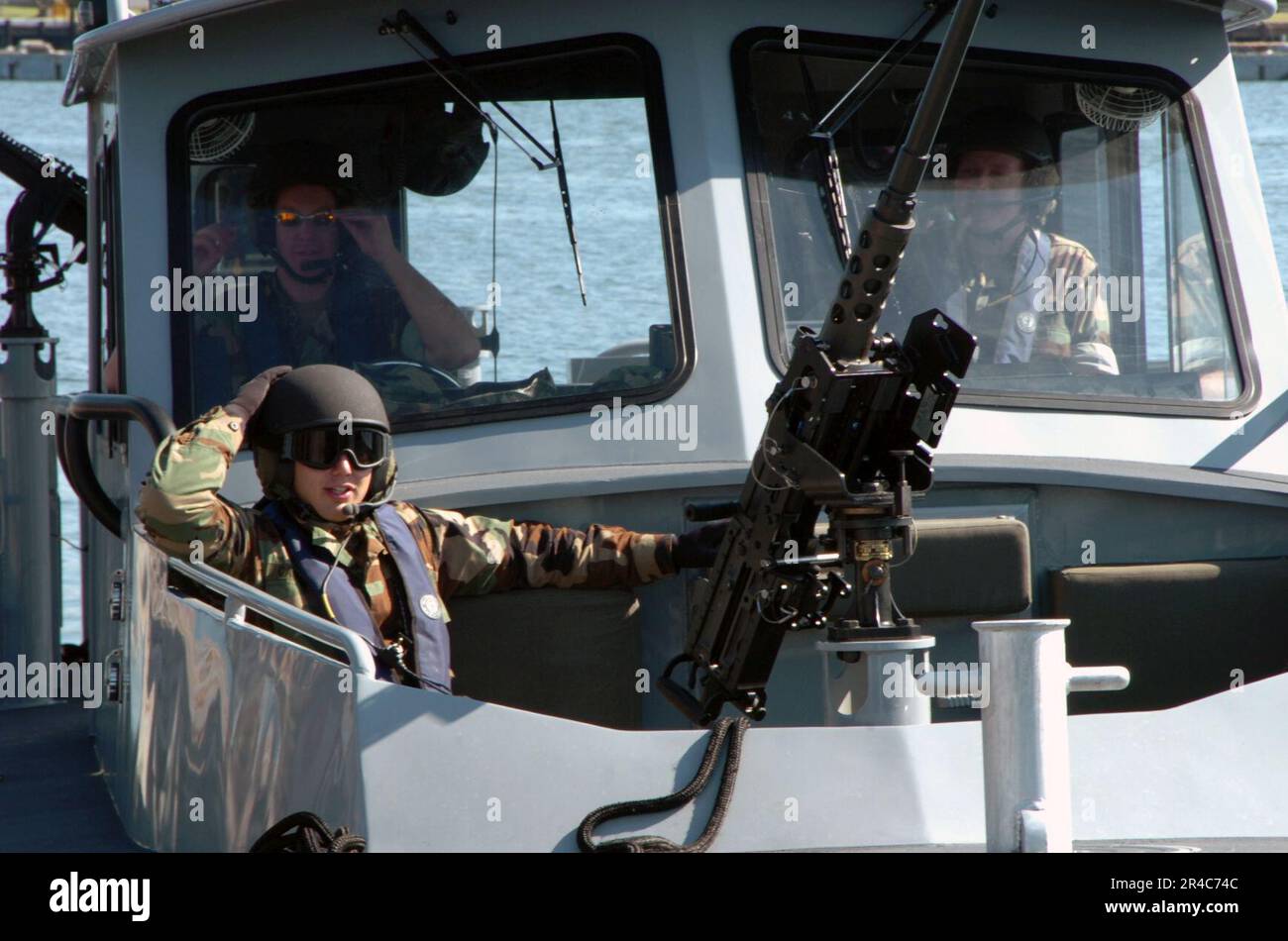 US Navy Information Systems Technician Seaman takes a seat aboard ...