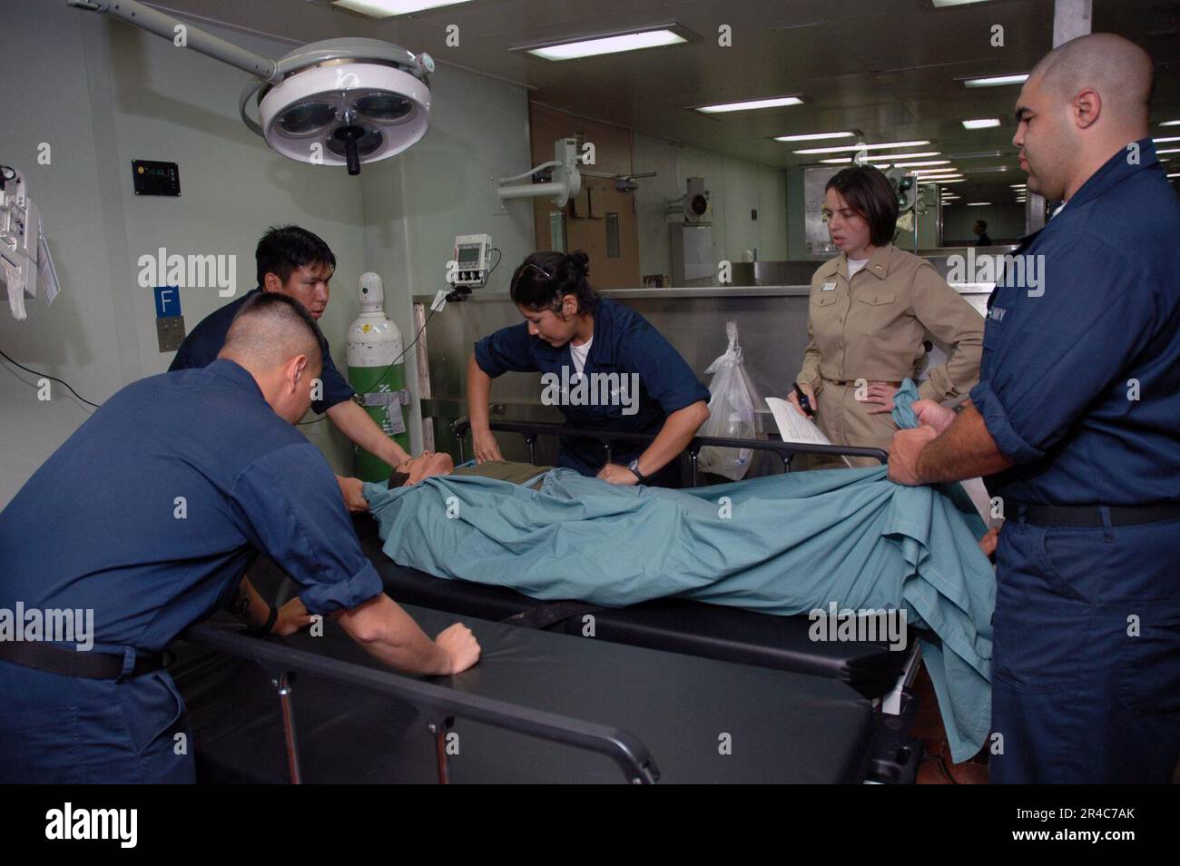 US Navy During the Corpsman Olympics, one of the four teams lifts a ...