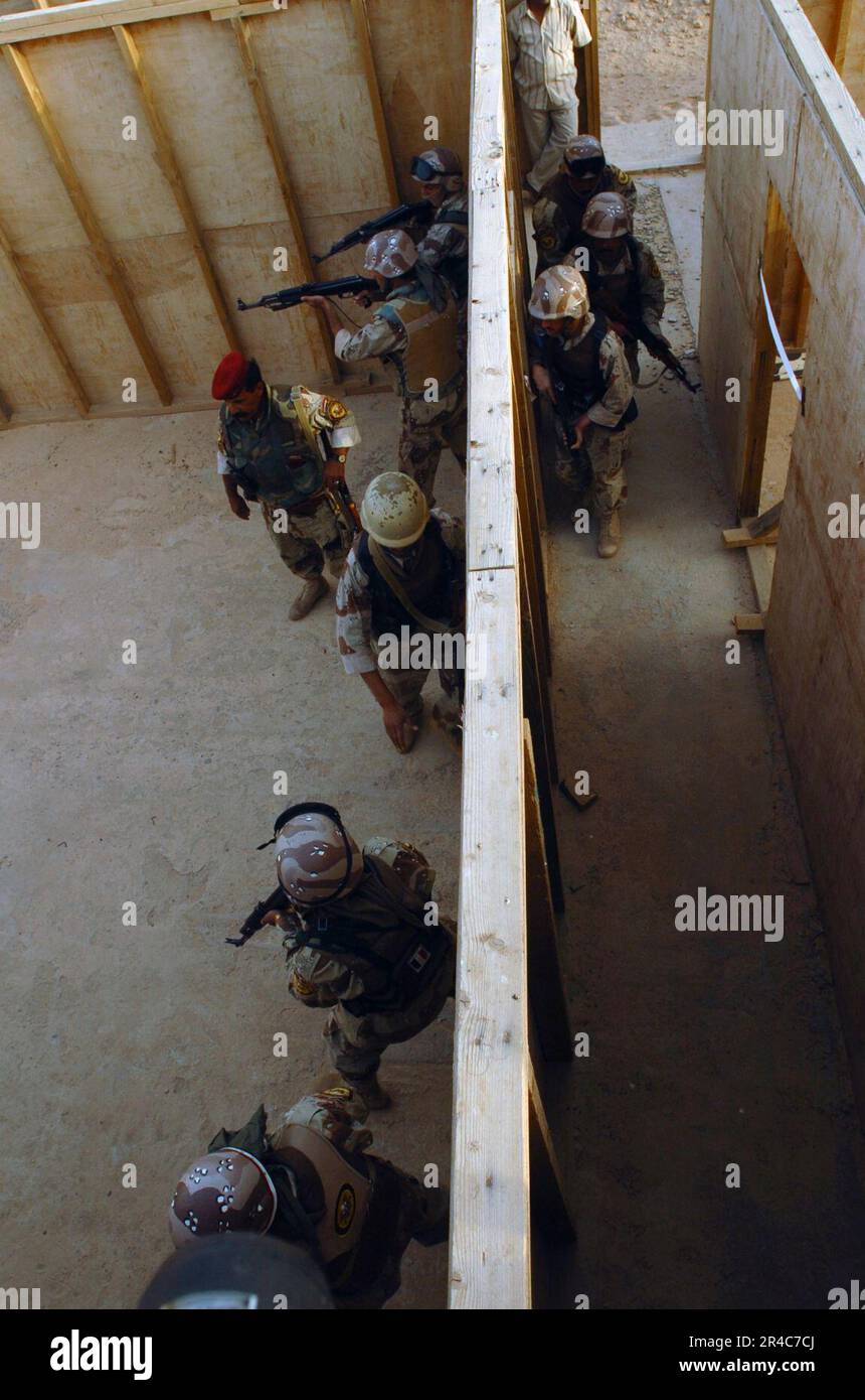 US Navy raqi Army soldiers clear a room during close-quarters battle ...