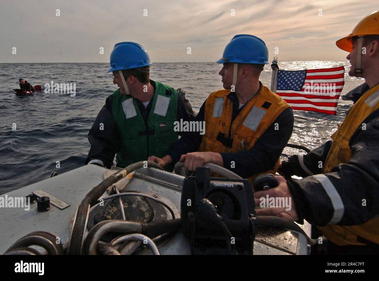 US Navy Boatswain's Mate 2nd Class a search and rescue (SAR) swimmer ...