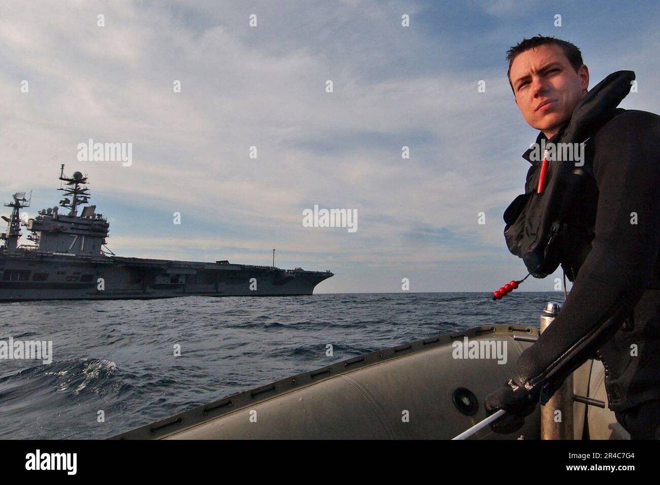 US Navy Boatswain's Mate 2nd Class a search and rescue (SAR) swimmer ...