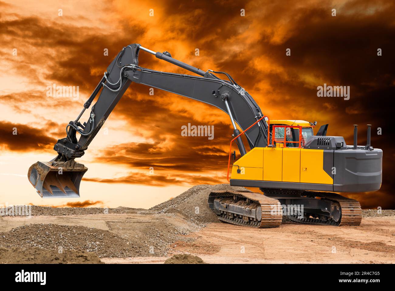 excavator is working and digging at construction site Stock Photo - Alamy