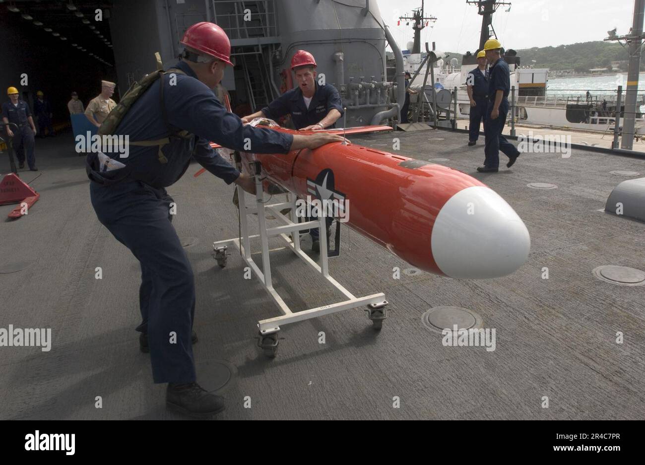 US Navy Aviation Support Equipment Technician 3rd Class left, and ...