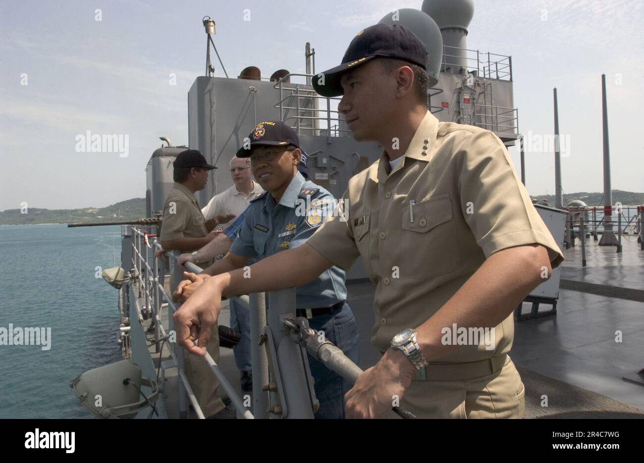 US Navy Philippines Navy Lt. and Indonesian Navy Maj. stand on the ...