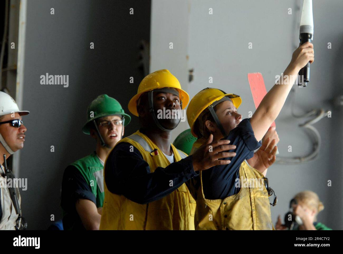 US Navy Boatswain's Mate 2nd Class assists in the training of Boatswain ...
