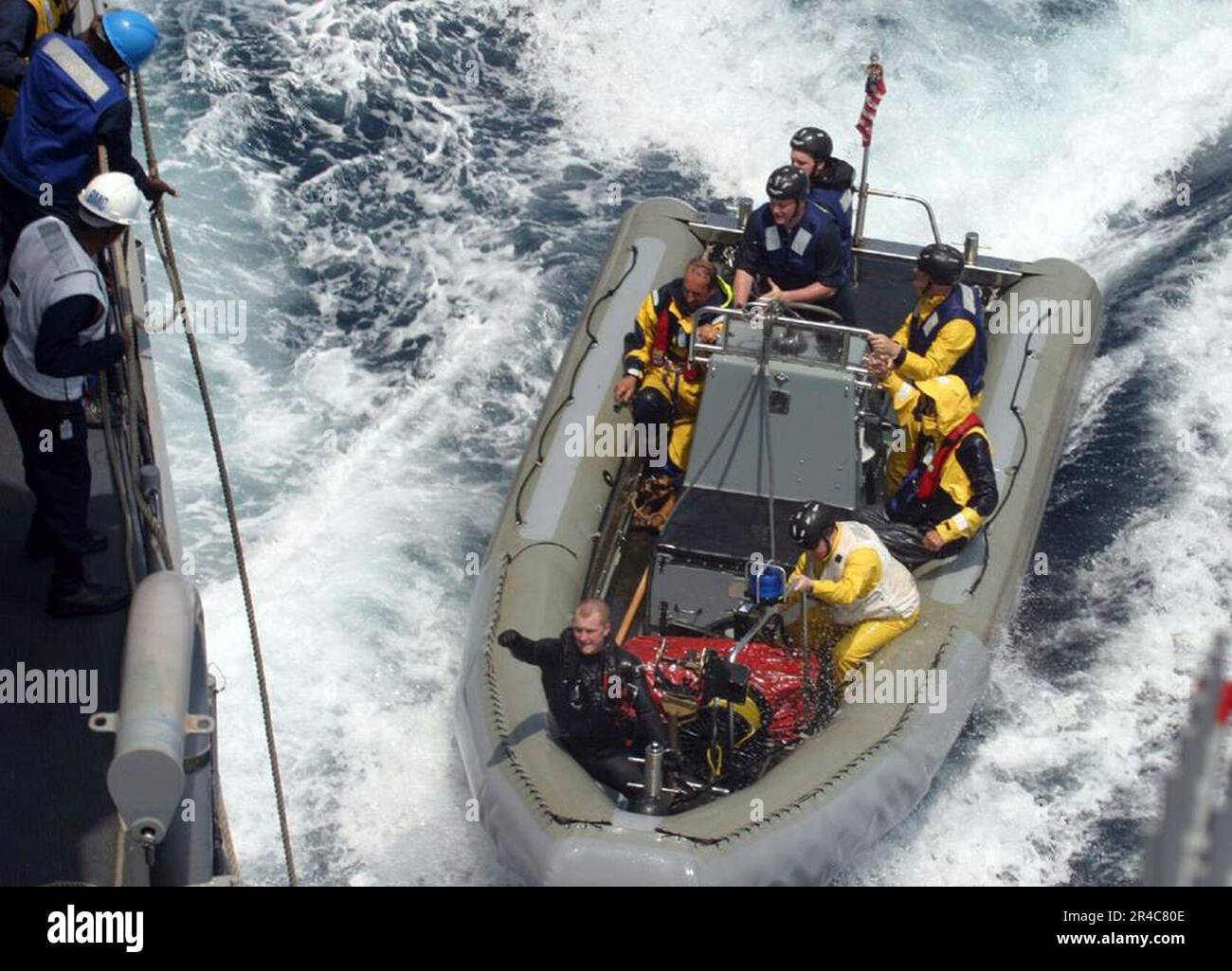 US Navy A rigid hull inflatable boat (RHIB) from the guided-missile ...
