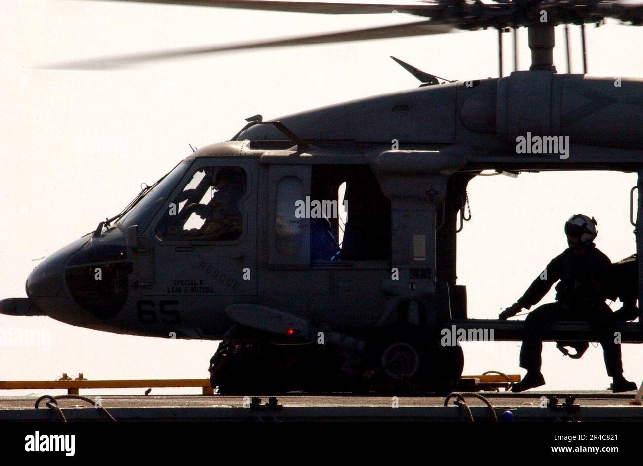 US Navy An SH-60F Seahawk assigned to the Black Knights of Helicopter ...