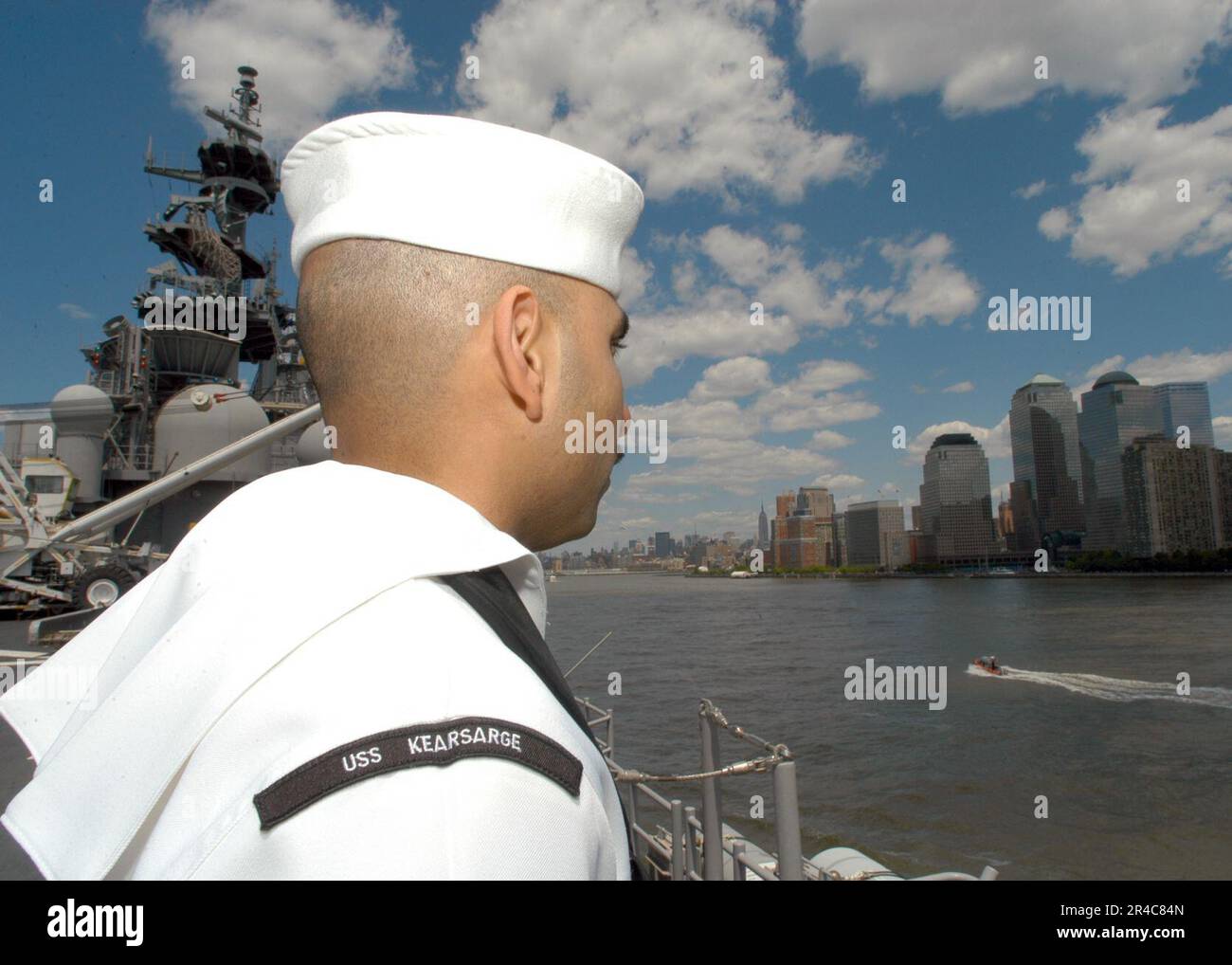 US Navy Ship's Serviceman mans the rail as the ship enters New York ...
