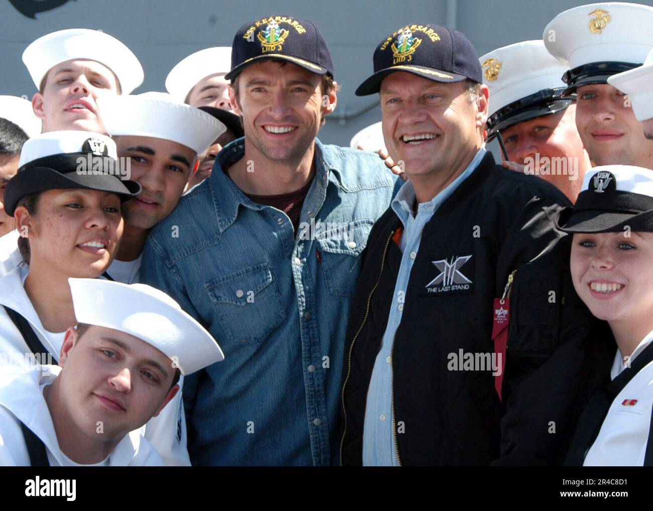 US Navy Actors Hugh Jackman and Kelsey Grammer, are surrounded by ...
