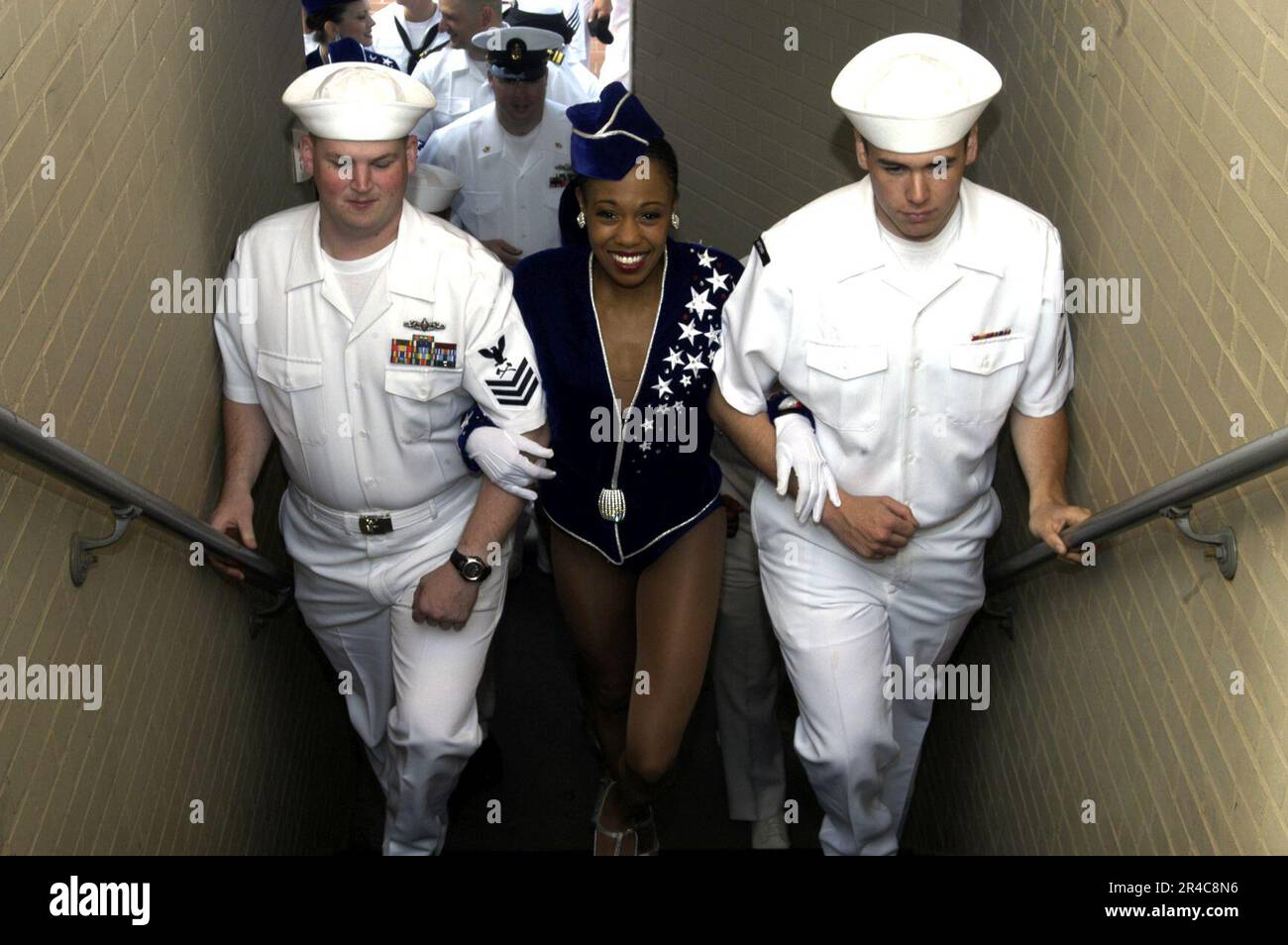 US Navy Sailors escort the Radio City Rockettes to the Top of the Rock ...