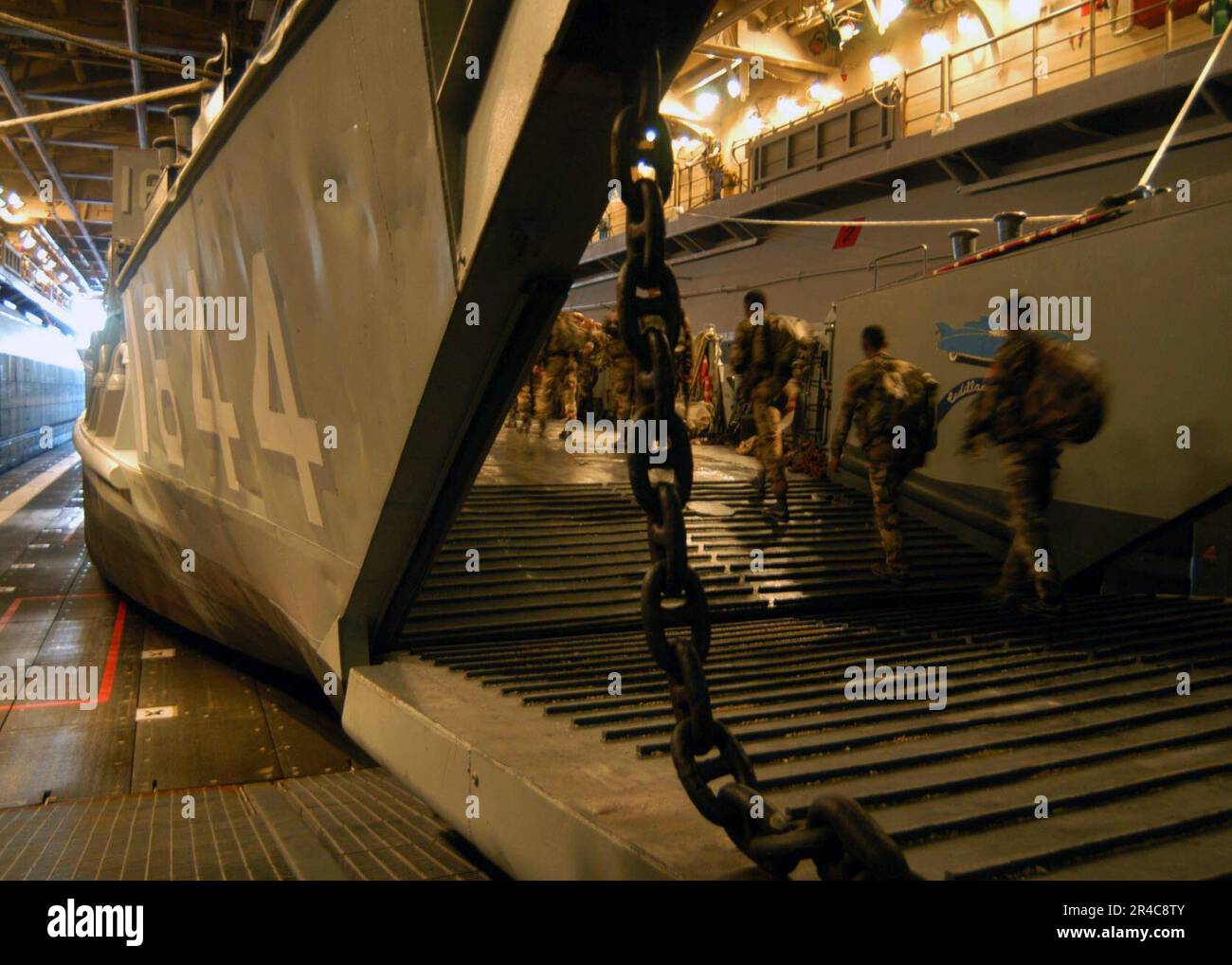 US Navy Dutch personnel board a Landing Craft Utility (LCU) aboard the ...