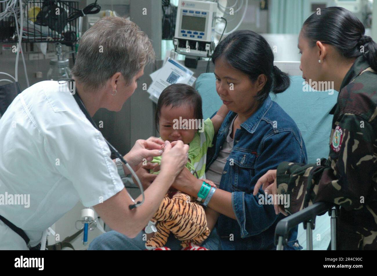 US Navy The first patient is admitted to the casualty receiving (CASREC ...