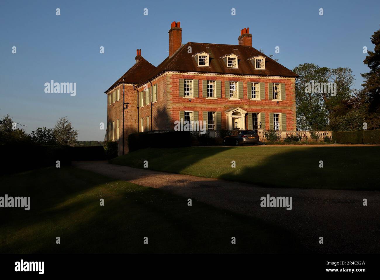 Sun lit Balcombe House Stock Photo - Alamy