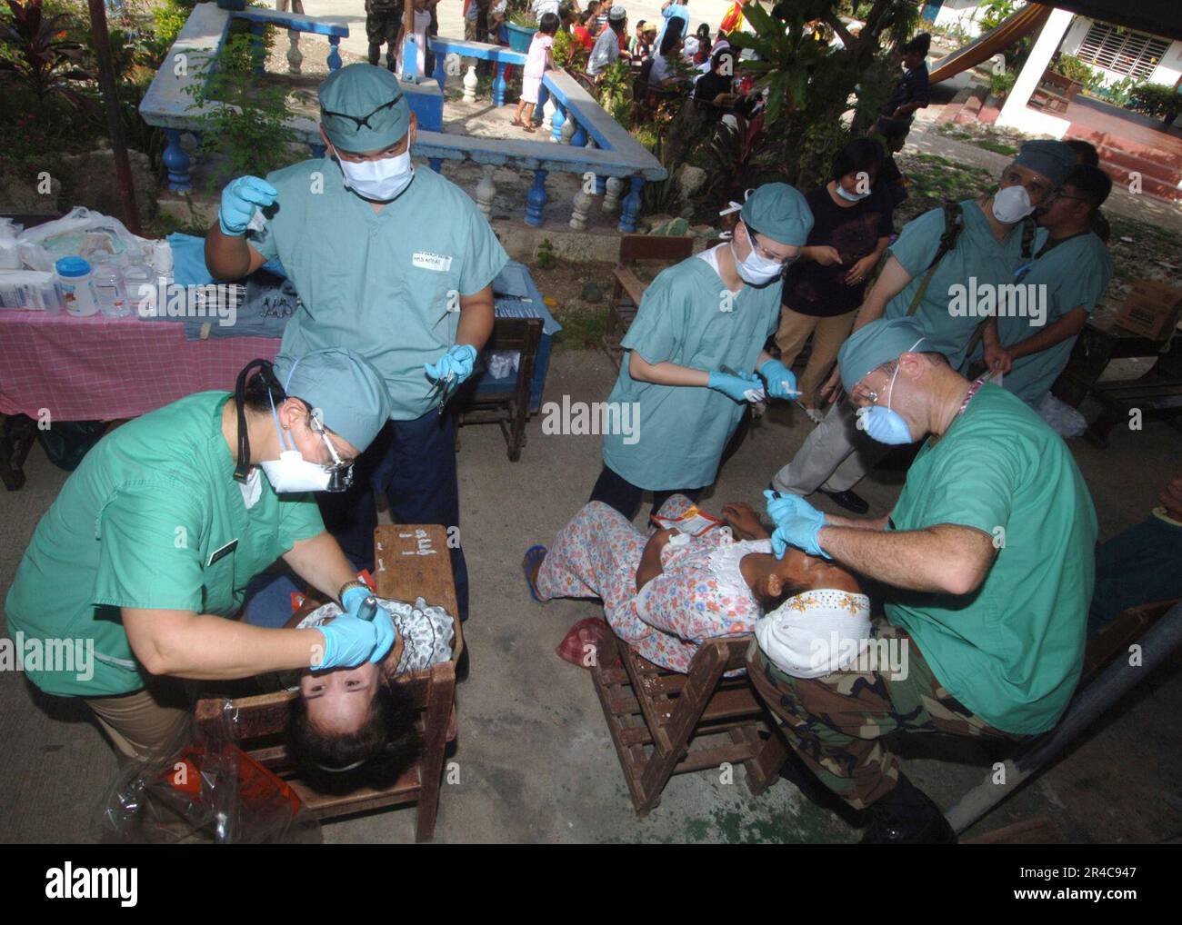 US Navy U.S. Navy Dentist Cmdr. left and Air Force Dentist Lt. Col ...