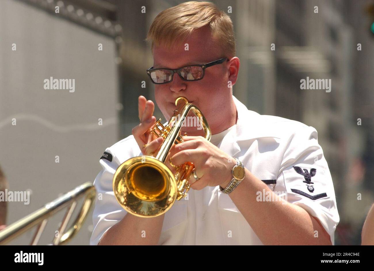 US Navy Musician 3rd Class plays the trumpet with the Northeast Navy ...