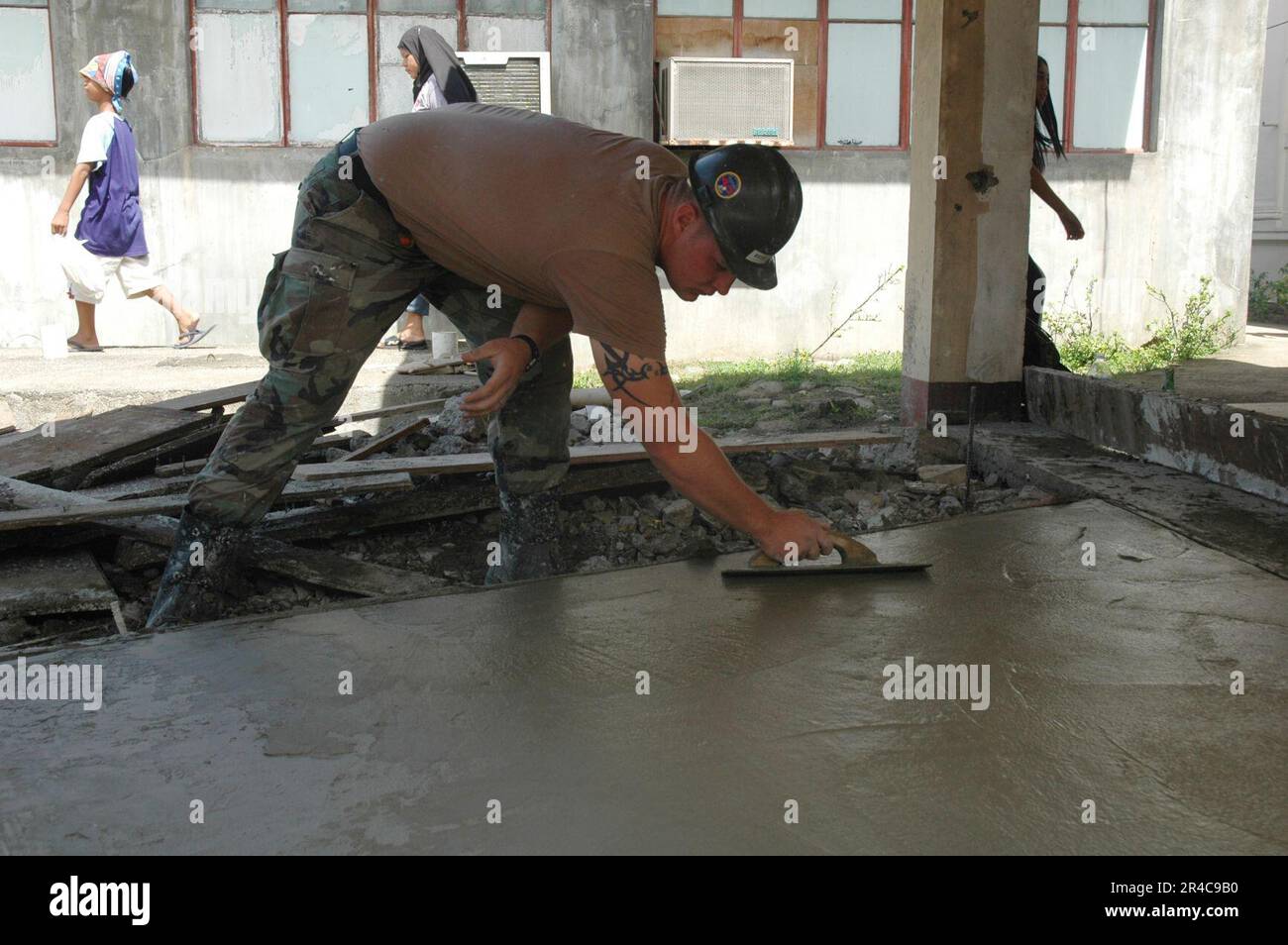 US Navy A Seabee assigned to Naval Mobile Construction Battalion Four ...