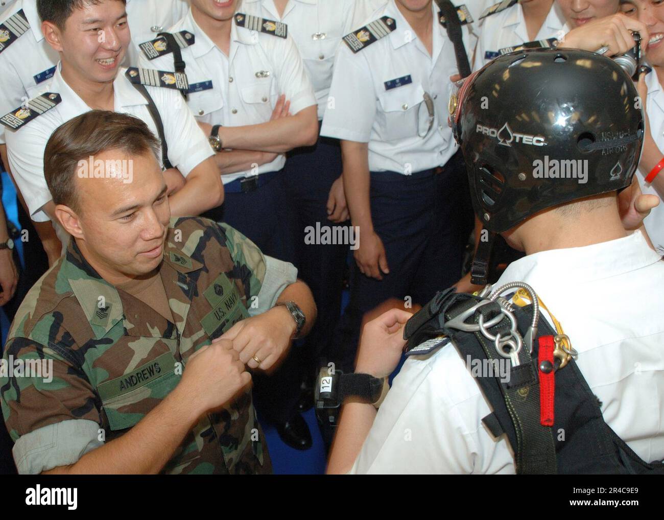 US Navy Petty Officer 1st Class a Navy parachutist assigned to Naval ...