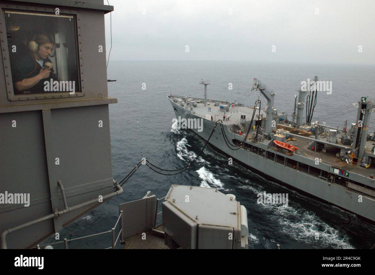 US Navy While observing a replenishment-at-sea (RAS), Yeoman Seaman ...