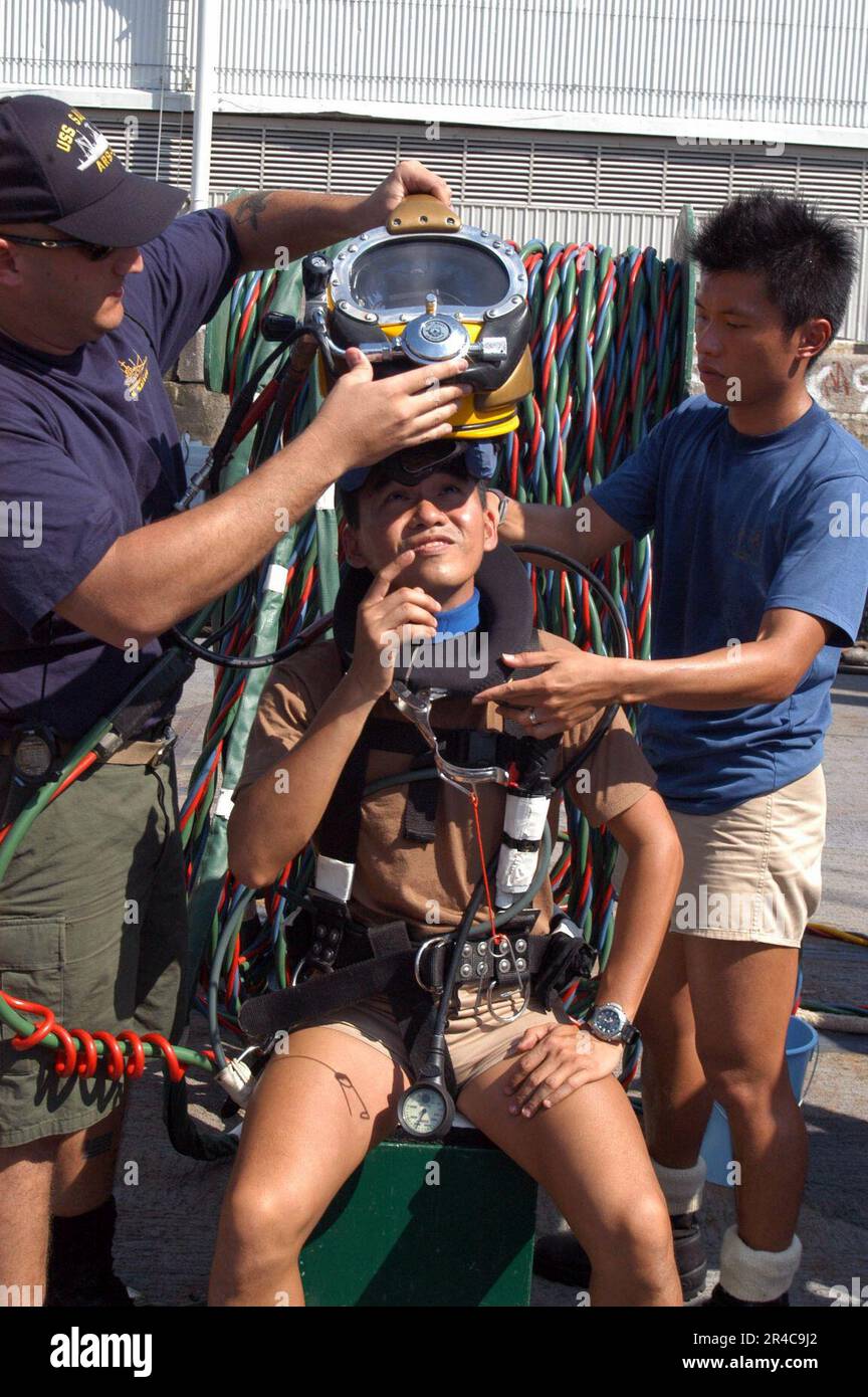 US Navy Chief Quartermaster and Republic of Singapore Navy (RSN) 1st ...