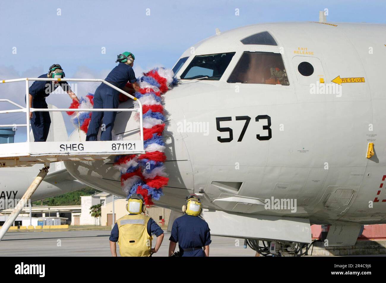 US Navy Sailors assigned to the Golden Swordsmen of Patrol Squadron ...