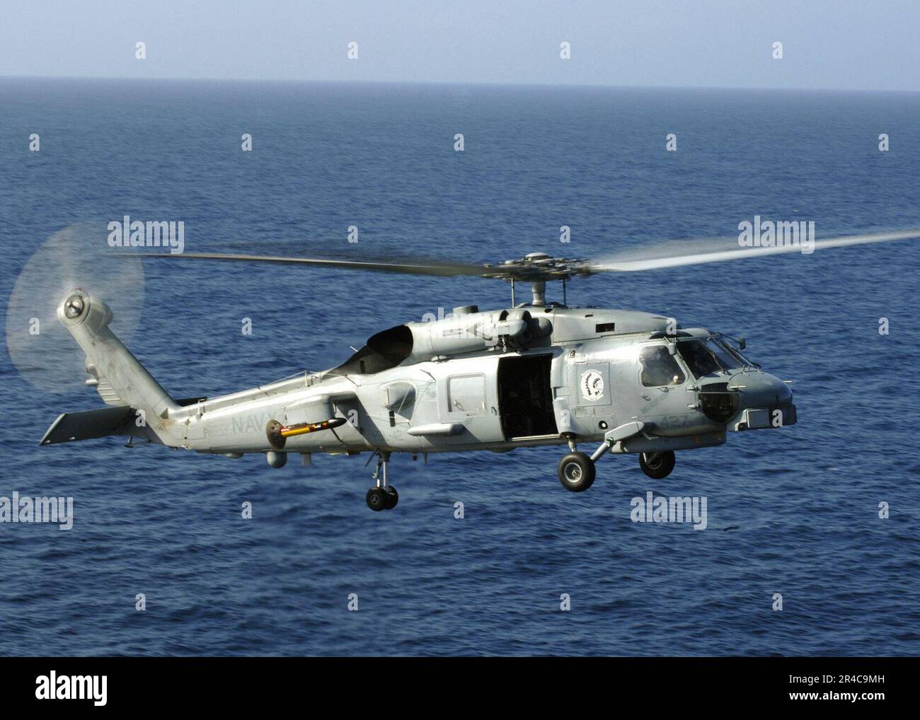 US Navy A SH-60B Seahawk helicopter assigned to the Proud Warriors of ...