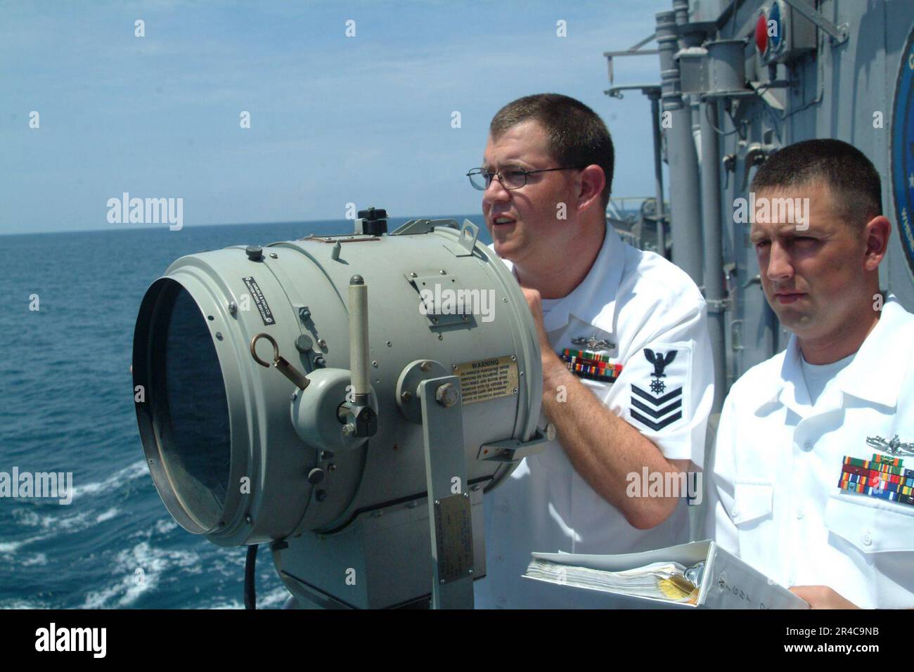 US Navy Sailors assigned to the Avenger-class mine warfare ship USS ...