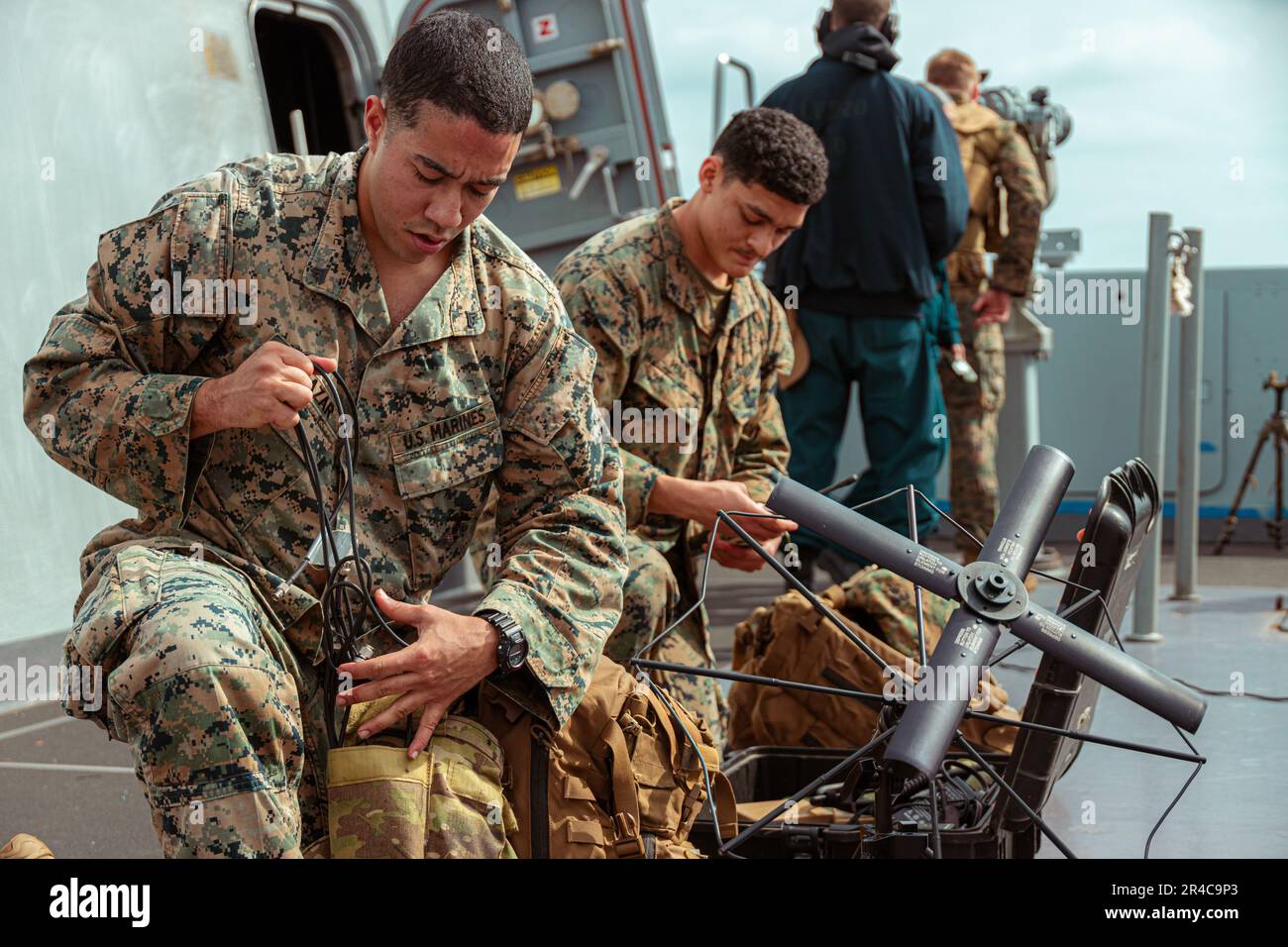 U.S. Marine Corps Cpl. Anthony Salazar, left, and Cpl. Edward Pena ...